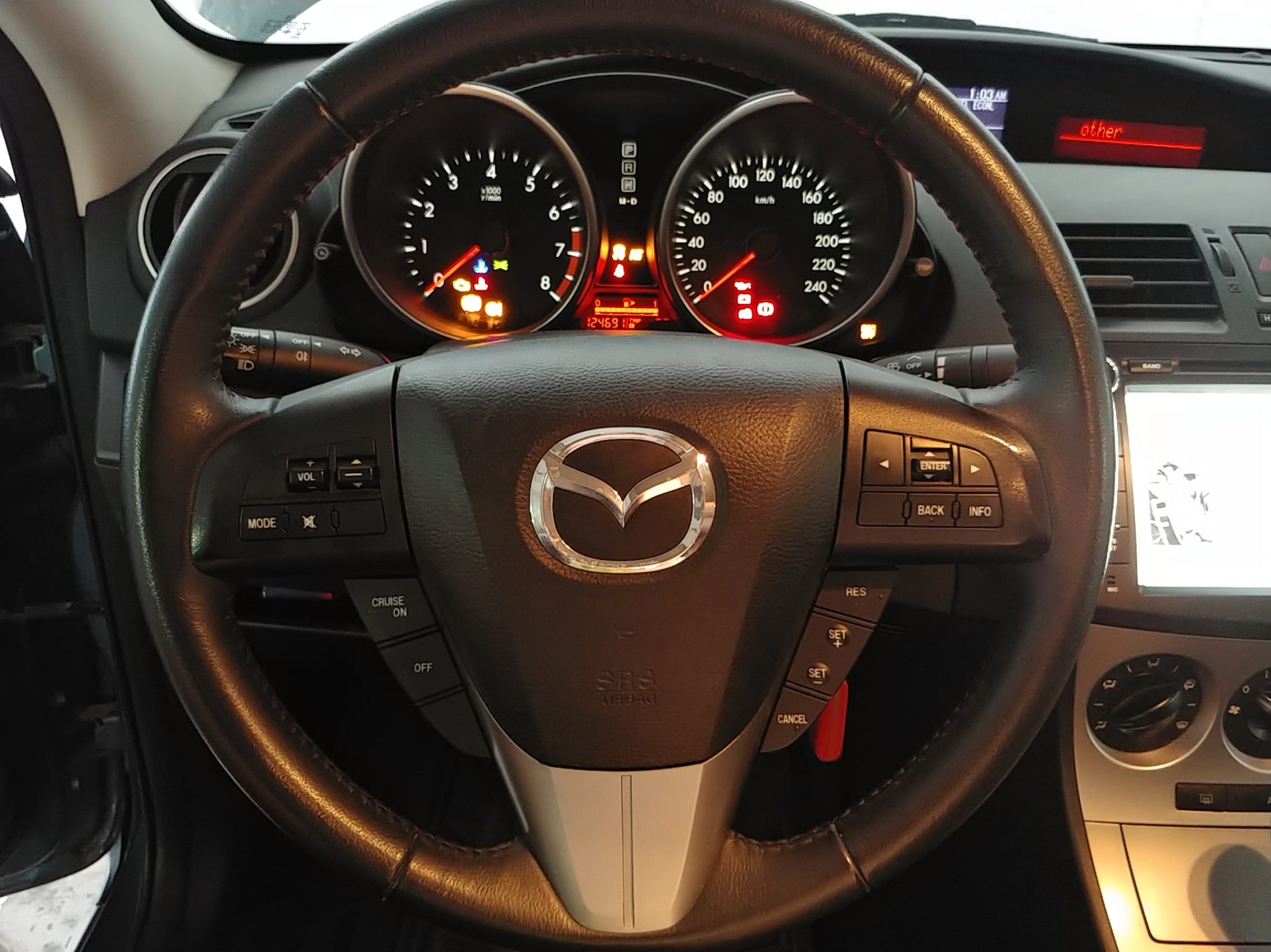 Repurposing unused steering wheel buttons as generic macros for an ...
